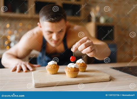 Naked Man In Apron Cooking Dessert On The Kitchen Stock Photo Image Of Love Cooking