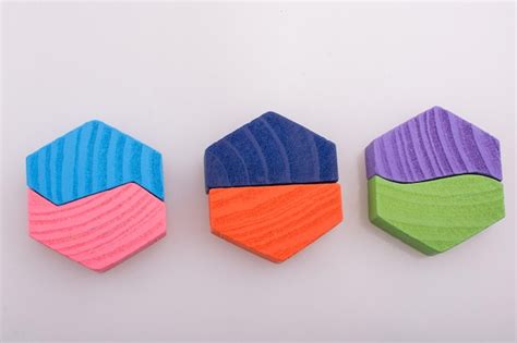 Premium Photo Colorful Wooden Pieces Of A Logic Puzzle