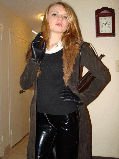 Mistress Moni Smoking In Black Leather 14 Ipod Version
