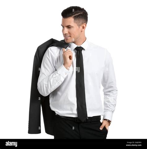 Handsome Man In Formal Suit Holding Jacket Over Shoulder On White