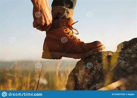 Crop Male Traveler Adjusting Boot Stock Photo Image Of Season Male 254557592