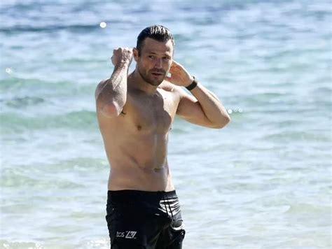 Mark Wright Shows Off His Ripped Abs As He Enjoys Run And Swim In Sunny