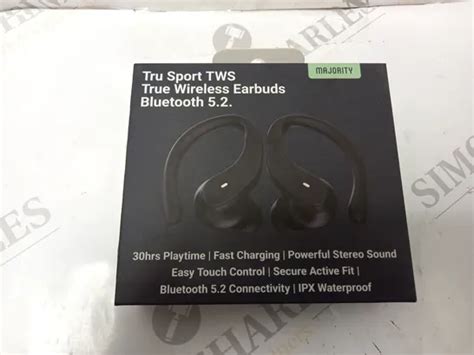 TRUE WIRELESS AROUND EAR EARBUDS IN BLACK Simon Charles Auctioneers