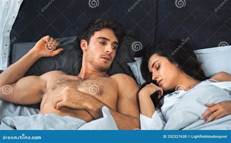 Awakened Shirtless Man Looking At Brunette Stock Photo Image Of Awakened Brunette