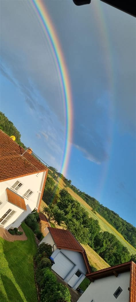 This Rainbow Going Into My Neighbors Backyard Rmildlyinteresting