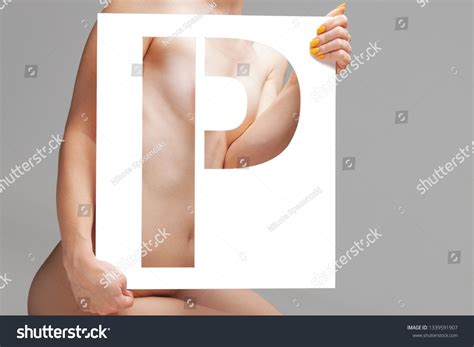 Nude Female Body Behind Stencil Letter Stock Photo 1339591907 Shutterstock