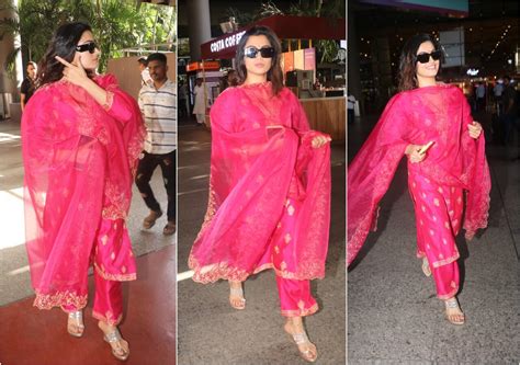 Rashmika Mandanna Spotted At Mumbai Airport In Pink Suit Check Out Photos रश्मिका मंदाना ने