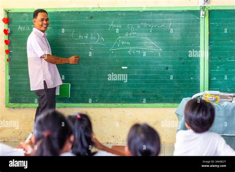 A Public Elementary School Teacher In Batangas Philippines Teaches Her