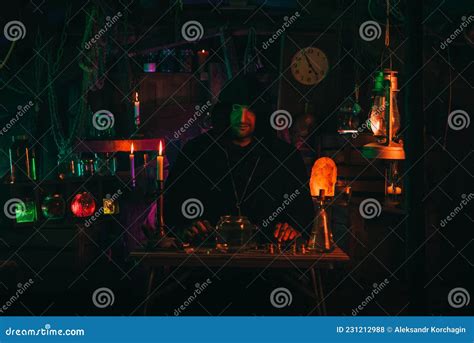 Dark Laboratory Room With Beakers With Colourful Fluids Created Using Generative Ai Technology