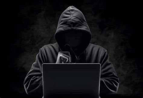 Premium Photo Photo Portrait Of Hacker Background With Gloves And Laptop