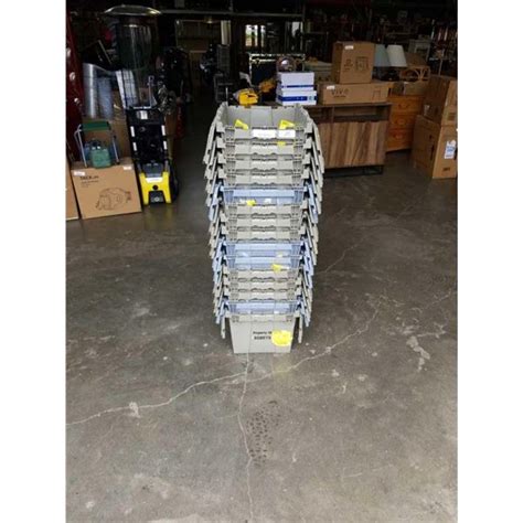 Stack Of 15 Totes With Built In Interlocking Lids