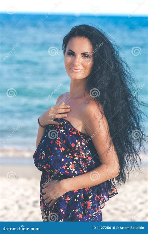 Young Woman Posing On The Tropical Beach Of Bali Island Indonesia