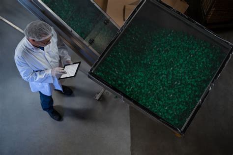Premium Photo Factory Engineer Using Digital Tablet In The Factory