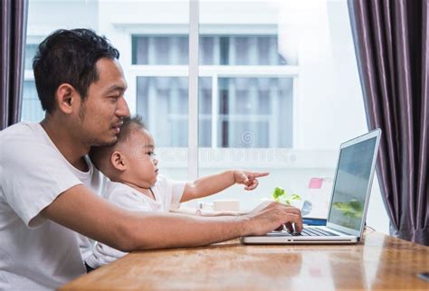 Man Father Using Working On Laptop Computer Stock Image Image Of Notebook House