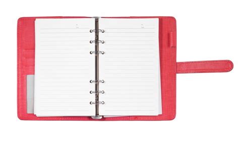Premium Photo A Red Notebook With A White Page In The Middle