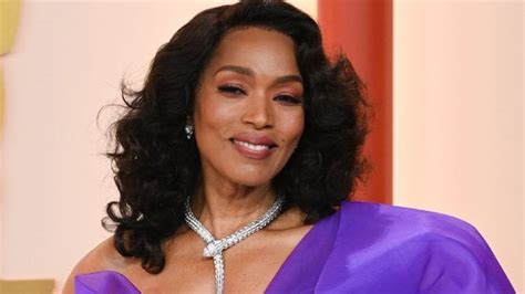 Angela Bassett Stuns In Plunging Purple Gown And Diamond Necklace At The