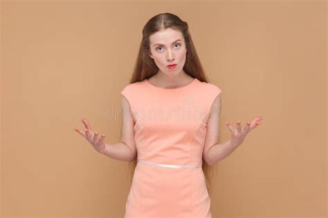 Beautiful Angry Woman With Long Hair Standing With Raised Arms Arguing Having Aggressive