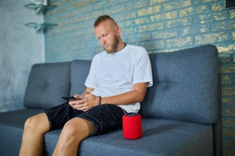 Premium Photo Male Testing Talking Smart Wireless Speaker Man Controlling Home Devices With A