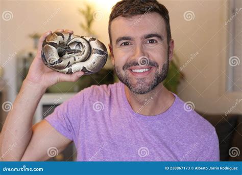 Cute Man Holding Exotic Ball Python Stock Image Image Of Body Curve