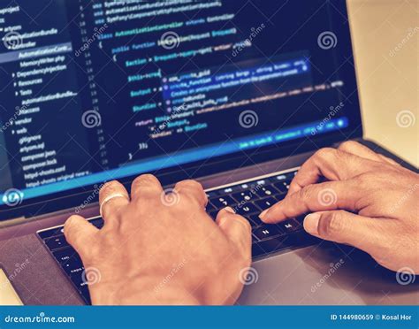 Close Up Of A Programmer S Hands Writing Source Codes Stock Image Image Of Computer Coding