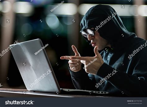 Hacker In Front Of His Computer Stock Photo Shutterstock