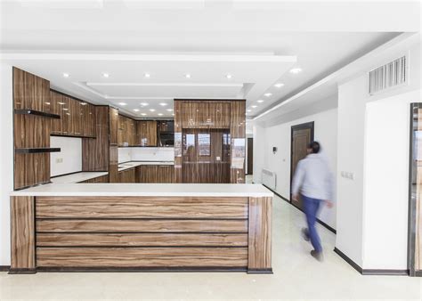 Pale Brickwork Creates Decorative Facade For Iranian Apartment Building