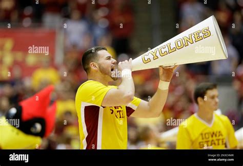 An Iowa State Cheerleader Shouts To Fans Before An Ncaa College Basketball Game Against Southern