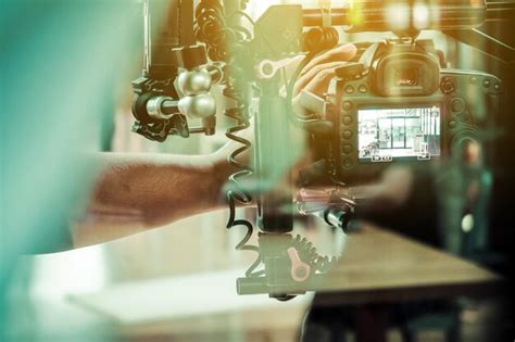 Premium Photo Close Up Of Man Operating Camera