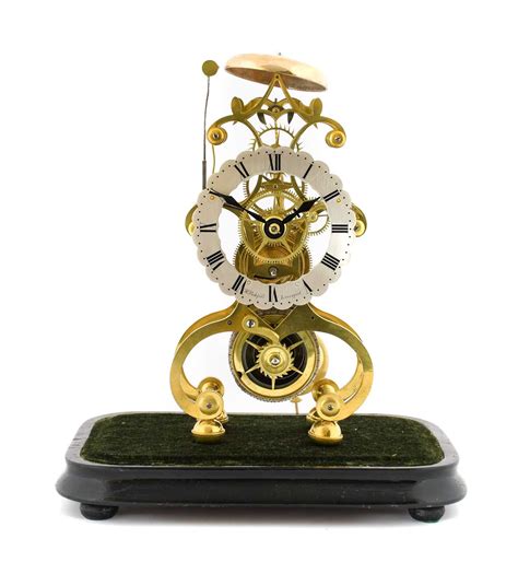 Lot 696 A Brass Skeleton Passing Strike Mantel