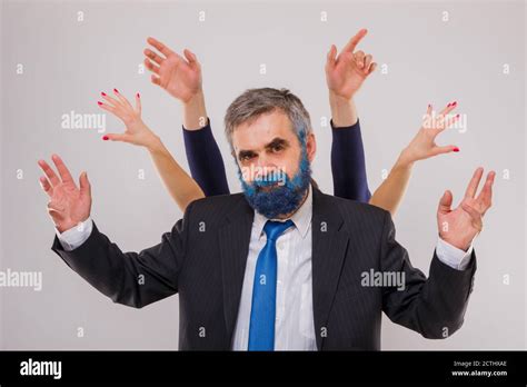 Man With Six Arms Embodying Multitasking Efficiency And Success Stock