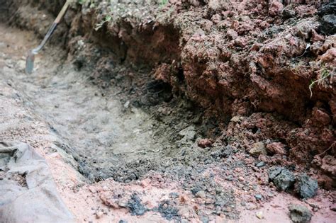 How To Build A Boulder Retaining Wall How Tos DIY