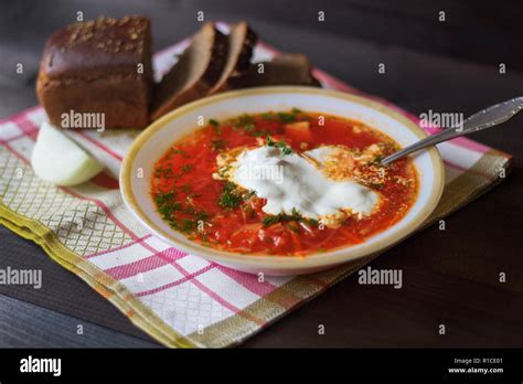 Traditional Ukrainian Russian Borscht On The Bowl Plate Of Red Beet Root Soup Borsch On Black