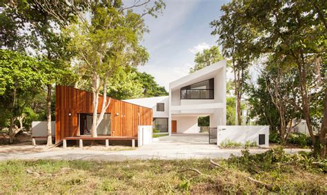 Canal Side House And Cafe In Thailand By Ekar Architects