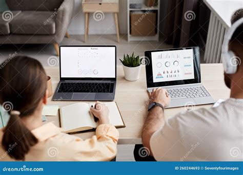 Selective Focus On Laptop Screens With Information Being Analyzed By Brokers Stock Image Image