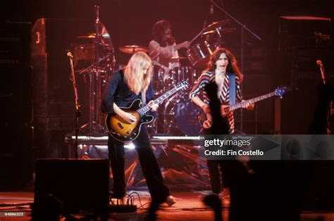 Alex Lifeson Neil Peart And Geddy Lee Performing Live Onstage On All