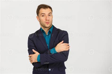 Young Man Having Doubts And With Confuse Face Expression While Scratching Head On Isolated White
