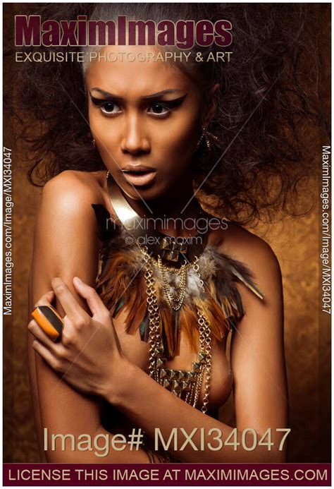 Photo Of Beauty Portrait Of Exotic Native Woman With Tribal Feather Necklace Over Naked Bronze