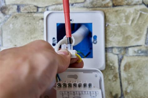 Premium Photo Wiring And Installing Thermostat For Floor Heating