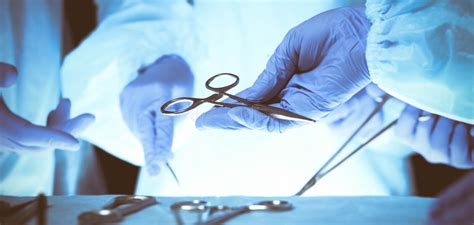 Surgeons Hands Holding Surgical Scissors And Passing Surgical Equipment Close Up Health Care