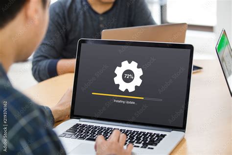 Man Working And Installing Update Process With Gearbox Percentage Progress And Loading Bar On