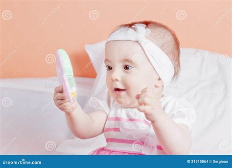 Babe Girl Playing With A Toy Surprise Stock Photo Image Of Family Hand