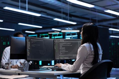 Free Photo Software Developers In Data Center Running System