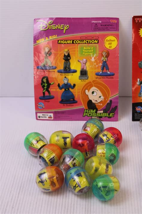 2 Full Sets Of Vending Machine Toys Kim Possible And Incredibles