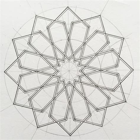 A Drawing Of A Circular Object With Lines In The Shape Of A Flower On Paper