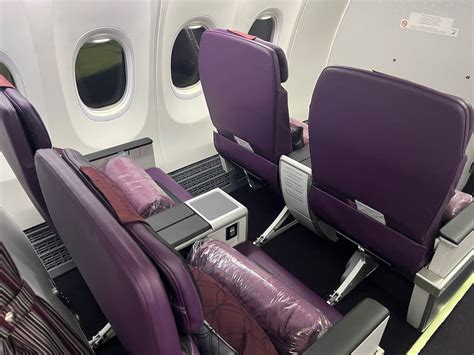 Review Qatar Airways Boeing 737 Max First Class Auh Doh One Mile