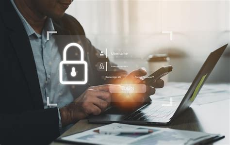 Premium Photo Businessman Using Mobile Phone And Laptop To Access Information Security And