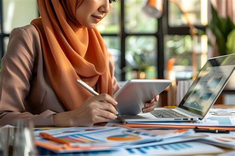 A Woman With A Graph On Her Laptop And The Graph Graph On The Top Of It Premium AI Generated Image