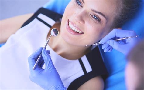 Premium Photo Young Female Patient With Pretty Smile Examining Dental