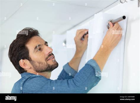 Man Installing Window Blinds In A House Stock Photo Alamy