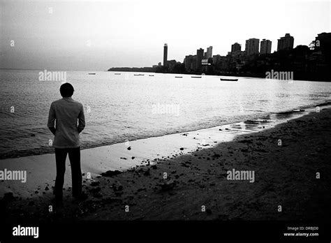 Man Pissing On Chowpatty Beach Mumbai Maharashtra India 1986 Stock